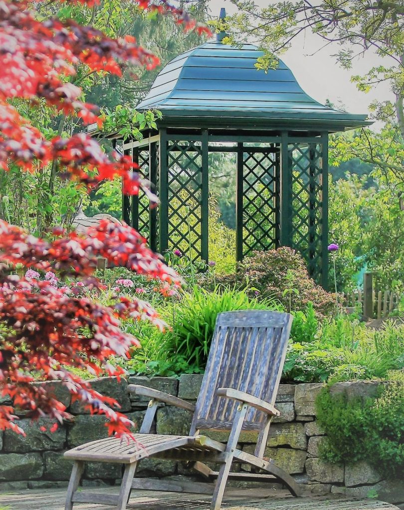 Impressive, high-quality wrought-iron gazebo with full or trellis roof.